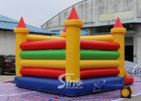 China Commercial Kids Rainbow Inflatable Bouncy Castle with Slide 5.8m x 5.0m CE Certified for sale