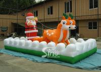 China Custom Outdoor Christmas Inflatable 6m Jingle Bells Father and Reindeers Running Together CE Certified for sale