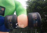 China 25ft High Inflatable Muscle Man for Gym Outdoor Promotion Customizable 7.5m for sale