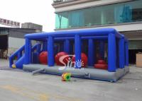 China Outdoor double lane adults interactive inflatable assault course with big bouncing balls for sale