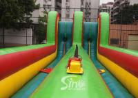 China 10m long double lane kids N adults inflatable bungee run for interaction games for sale