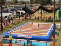 China Giant Inflatable Jump Pad 15x9m Heavy Duty PVC Bounce Mat for Kids Adults Outdoor Party Fun for sale