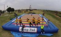 China Giant Inflatable Jump Pad 15x9m Heavy Duty PVC Bounce Mat for Kids Adults Outdoor Party Fun for sale