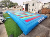 China Giant Inflatable Jump Pad 15x9m Heavy Duty PVC Bounce Mat for Kids Adults Outdoor Party Fun for sale