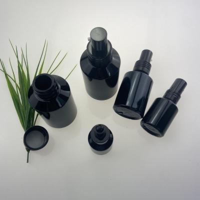 China 15ml 30ml 60ml 100ml 120ml Empty Round Black Slant Shoulder Cream Glass Bottle for sale