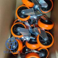 China 4 Inch Hollow Core Polyurethane Wheels Orange Black Wheel Swivel Locking Casters for sale