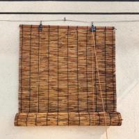 China Natural Reed Roll-up Blind with 70% Light Blockage Easy to Install and Longer Lifespan for Porch Decoration for sale