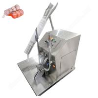 China Garlic Mesh Bag Packing Machine Vegetables Mesh Packing Machine Pepper Mesh Bag Packing Machine for sale