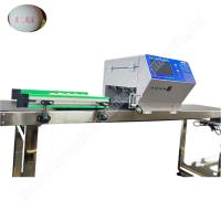 China 220v 50hz Egg Stamping Machine Inkjet Egg Coding Machine 50000 Eggs/H for sale