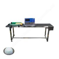 China Tray Pad Egg Carton Printing Machine Date Egg Printer Machine 45000 Eggs/H for sale