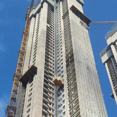 China Galvanised Mast Finish Construction Hoist Featuring Operating Temperature Range Minus 20 Celsius To 50 Celsius For And Safe Vertical Transport for sale