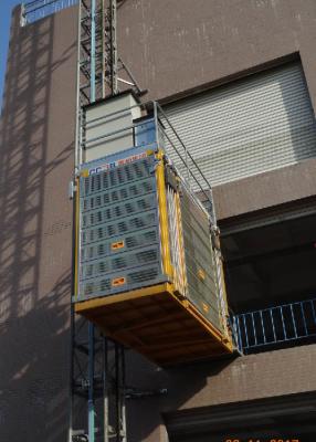 China Rack Pinion Type Building Site Hoist 3 Doors With Sandblasting / Painted Finishing for sale