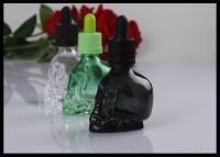 China Skull 30ml Essential Oil Glass Dropper Bottles Clear Green Black Bottle for sale