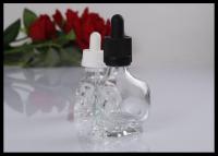 China Skull 30ml Essential Oil Glass Dropper Bottles Clear Green Black Bottle for sale