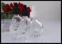 China 30ml Skull Shape Glass Dropper Bottle E Liquid E Juice Glass Bottle for sale