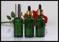 China 30ml Green Glass Bottle Essential Oil Bottle Cosmetic Liquid Bottle for sale