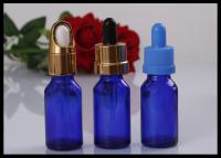 China Blue Glass Dropper Bottles , Empty Essential Oil Bottles With Childproof  Caps for sale