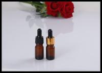 China Clear Mini Amber Essential Oil Glass Bottles 5ml Childproof Caps For Medical Packing for sale