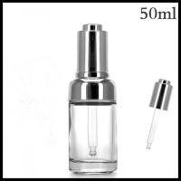 China Clear Glass Dropper Bottles Easy Carrying With Gold / Silver Press Lid Cap for sale