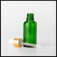 China Olive Essential Oil Glass Bottles Green Round Tamper Proof Screw Cap TUV Approval for sale