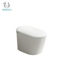 China Modern Smart One Piece Toilet 700x410x470mm with Foot Flush and Siphon Flushing for sale