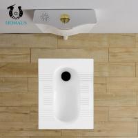 China CUPC Certified S Trap Ceramic Squatting Pan Toilet 580x450x190mm Commercial Sanitary Ware for sale
