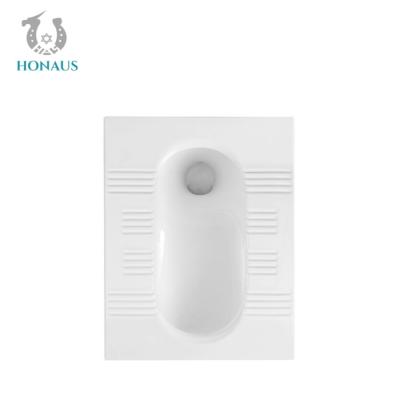 China ODM OEM Traditional Ceramic Squatting Pan Toilet 600x450x240mm S-Trap White for sale