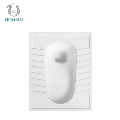 China Ceramic Squat Toilet 600x450x240mm S-Trap High Temperature Fired Squat Pan for Hotel School for sale
