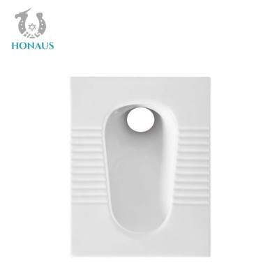 China Ceramic Squatting Pan Toilet 580x460x190mm S-Trap White Scratch Resistant for sale