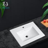 China Nordic Minimalist Ceramic Undermount Basin 610x465x170mm with Overflow for sale