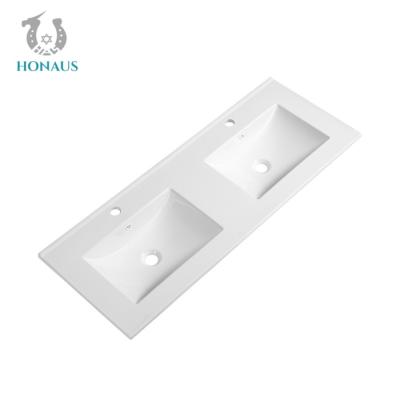 China Nordic Minimalist Ceramic Undermount Basin 610x465x170mm with Overflow for sale