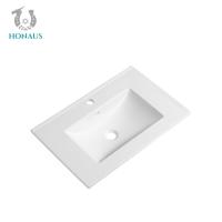 China Nordic Minimalist Ceramic Undermount Basin 610x465x170mm with Overflow for sale