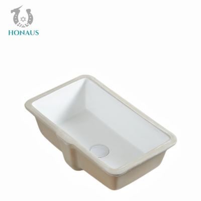 China Stain Resistant Undermount Ceramic Wash Basin 510x300mm with Overflow for sale