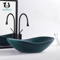 China Matte Black Jade Green Ceramic Countertop Basin 610x360mm Modern Nordic Style Bathroom Sink for sale