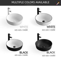 China Ceramic Glazed Bathroom Countertop Basin Round Shaped Hand Wash Basin for sale