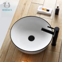 China Ceramic Glazed Bathroom Countertop Basin Round Shaped Hand Wash Basin for sale