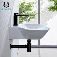 China Modern Streamlined Surfaces Bathroom Wall Hung Bain Sink Hand Wash Wall Mounted for sale