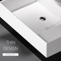 China Small Ceramic Wall Hung Basin 460x600mm Modern Bathroom Sink with Overflow for Hotel Apartment for sale