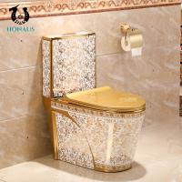 China Luxury One Piece Toilet Bowl 690x390x780mm Golden Siphonic Dual Flush Floor Mounted S-Trap for sale