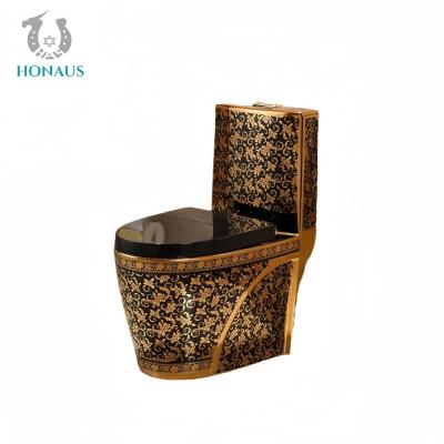 China Luxury One Piece Toilet Bowl 690x390x780mm Golden Siphonic Dual Flush Floor Mounted S-Trap for sale