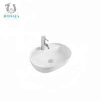 China Oval Bathroom Countertop Basin 1280 Degree Burned Ceramic 600x400x135mm Customizable for sale
