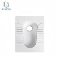 China Ceramic Squatting Pan Toilet 560x425x230mm Anti Scratch Glaze Anti Slip Front Back Flush for sale