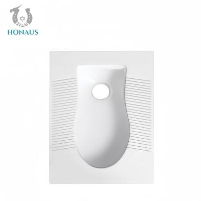 China 560x420x155mm Ceramic Squatting Pan 415mm Pit Distance No S Bend Small Bathroom Toilet for sale