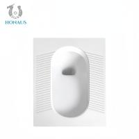 China ODM 390mm Pit Distance Ceramic Squatting Pan Toilet 560x440x230mm for Project Building for sale