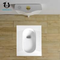China ODM 390mm Pit Distance Ceramic Squatting Pan Toilet 560x440x230mm for Project Building for sale