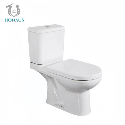 China Two Piece Toilet Bowl 766x376x720mm Dual Flush 250-305mm Pit Spacing Elongated Ceramic for sale