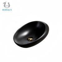 China Luxury Black Ceramic Countertop Basin Art Design 480x330x140mm Custom for sale