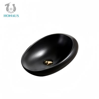 China Luxury Black Ceramic Countertop Basin Art Design 480x330x140mm Custom for sale