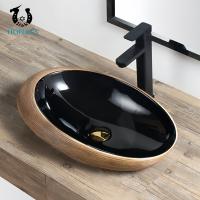 China Luxury Black Ceramic Countertop Basin Art Design 480x330x140mm Custom for sale