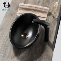 China Luxury Black Ceramic Countertop Basin Art Design 480x330x140mm Custom for sale